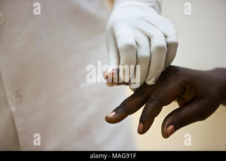 Doctor's hands making a patient's blood test Stock Photo - Alamy
