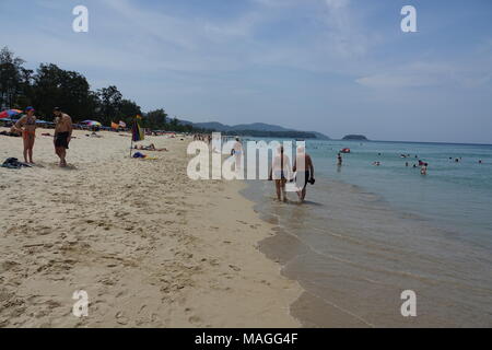 14 March 2018, Thailand, Karon Beach: Tourists walking and sunbathing ...