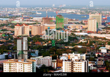 Aerial view of Cebu City looking northeast, with port, Robinsons ...