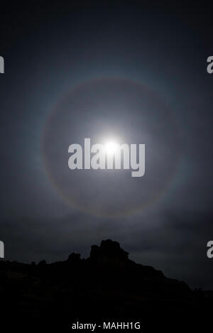 A moon halo is an atmospheric optical phenomenon Stock Photo - Alamy