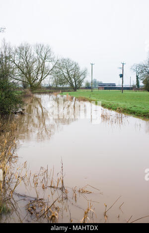 Floodwater from burst riverbank of the River Avon overwhelms the ...