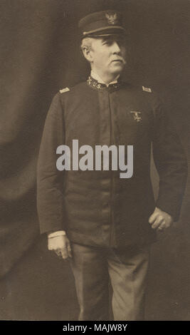 Nearly full-length portrait of John G. Wright. He is seated and wearing ...