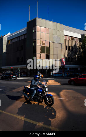 Biker reflection in a street puddle Stock Photo - Alamy