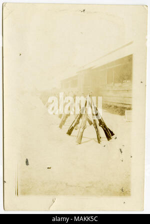 Row of Rifles Stacked in Formation Stock Photo - Alamy