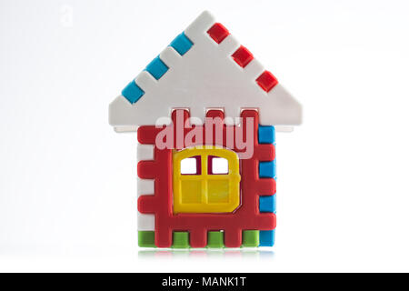 Toy colorful house isolated over white background Stock Photo - Alamy
