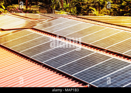 Roof with solar panels fragment under sunny blue sky Stock Photo - Alamy