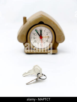 picture of a keys in front of vintage alarm clock Stock Photo - Alamy