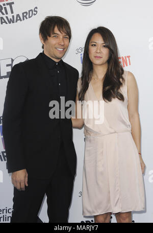 Sean Baker and Samantha Quan, winners of the Best Picture award for ...