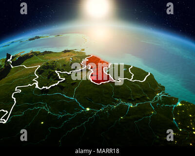 Sunset above Guyana highlighted in red on planet Earth with visible ...