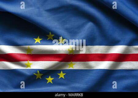 Old waving Cape verde flag, worn, stained, and crumpled. Textured canva ...