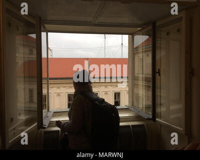 Visitor looks out from the bathroom window in the official residence of ...