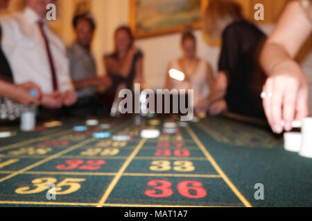 Gamblers gambling for fun at a corporate event Stock Photo - Alamy