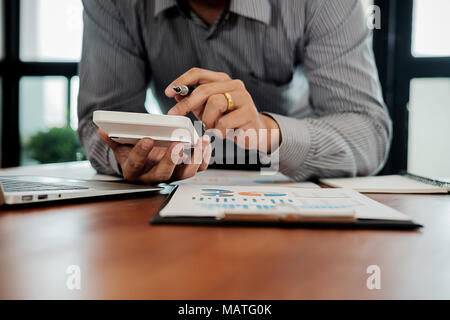 Administrator businessman making report, calculating balance. Business ...