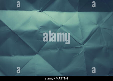 Photograph of a folded paper background or texture Stock Photo - Alamy