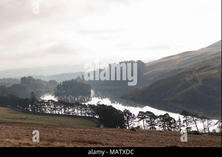 Flotterstone water reservoir near Edinburgh surrounded by the snowy ...
