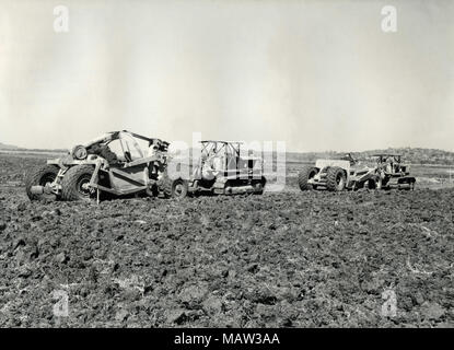 Soil conservation machines levelling on surface irrigation farm ...