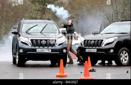 A member of the Close Protection Unit Royal Military Police (right ...