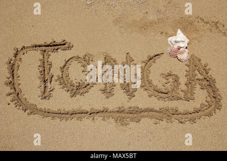 Word "Tonga" written in a sand - travel concept Stock Photo - Alamy