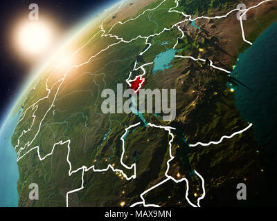 Burundi during sunset highlighted in red on planet Earth with clouds ...