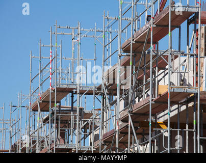Scaffolded residential building, construction site, refurbishment ...