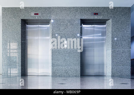 Modern elevator and granite tile Stock Photo - Alamy