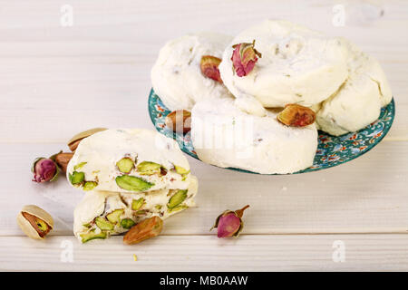 Traditional Iranian and Persian pieces of white nougat dessert sweet ...