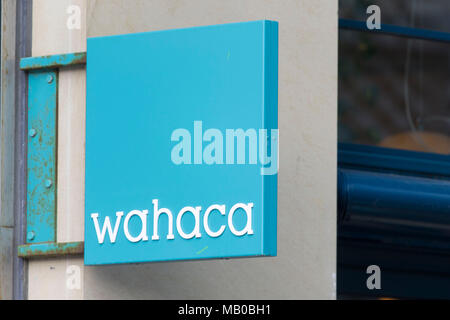 Wahaca restaurant sign logo Stock Photo - Alamy