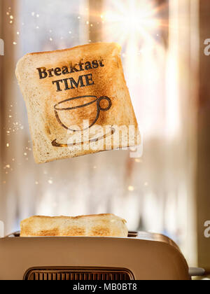 Toast bread jumps out of the toaster Stock Photo - Alamy