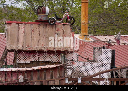 tricycle on rooftop as conceptual photography Stock Photo - Alamy