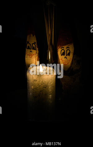 wooden dwarf in candle light Stock Photo - Alamy