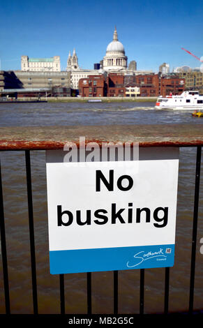 London, England, UK. No busking sign on the South Bank, St Paul's ...