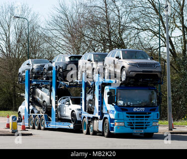 car transporter lorry loaded with new cars Stock Photo - Alamy