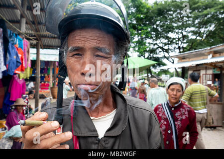 burmese woman smoking in market, bagan, myanmar, burma Stock Photo - Alamy
