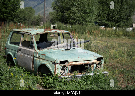 Old rusty broken down junk trucks Stock Photo - Alamy