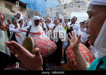 Ethiopian Orthodox Christian pilgrims play the Kebero a double-headed ...
