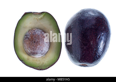 round black avocado variety in Ecuador in a wooden bowl Stock Photo - Alamy