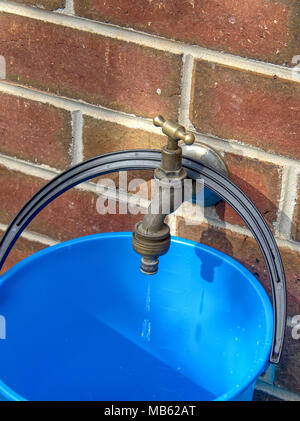 drop in the bucket Stock Photo - Alamy