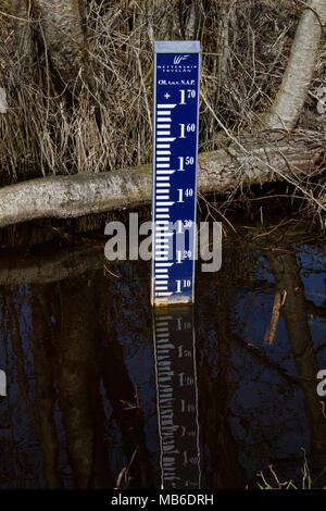 Water depth gauge in small reservoir, Oregon Stock Photo - Alamy