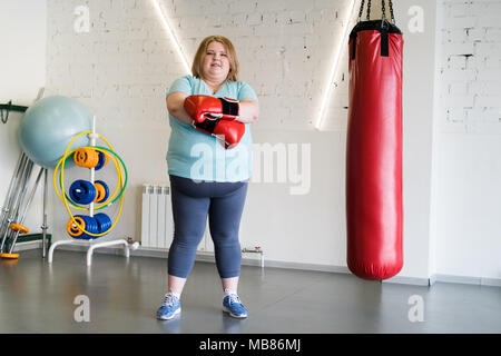 Overweight Woman Boxing in Gym Stock Photo - Alamy