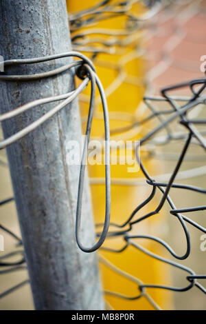 The Broken and bent metal fence Stock Photo - Alamy