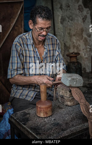 workshop of making textile and leather travel bag - craftsman ...