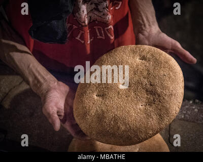 A traditional bakery in Marrakech, Morocco: people prepare their doughs ...