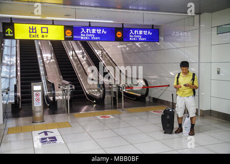 Tokyo Japan,Asia,Orient,Haneda Airport,escalator,English and Japanese ...