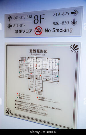 Emergency exit sign in Japan Stock Photo - Alamy