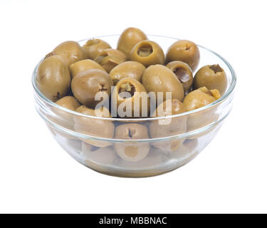 Green colossal olives hand stuffed with garlic gloves isolated on white ...