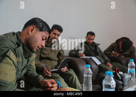 Armed members of the Internal Security Forces also known as the Asayish ...