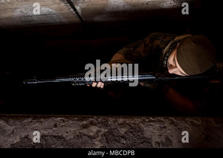 Arab soldier aiming with Kalashnikov AK-47 assault rifle Stock Photo ...