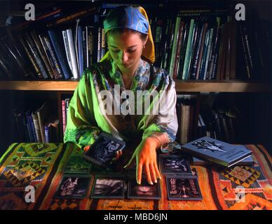 Dealing out cards Stock Photo - Alamy