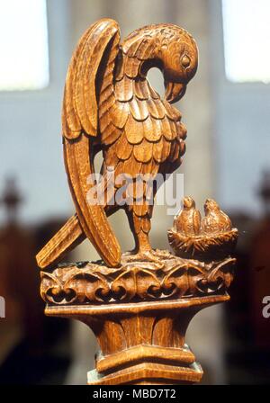 Christian Pelican feeding her young with her blood one of the enduring ...