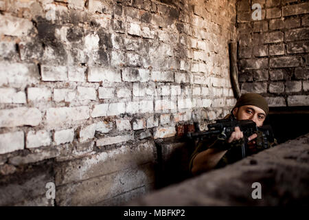 Arab soldier aiming with Kalashnikov AK-47 assault rifle Stock Photo ...